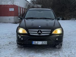 Black Mercedes-Benz ml-55-amg 2002 in Riga, with an engine capacity of 5.50 L and mileage of 265 thousand km for 5900 €, photo 3 on AUTOMOTO.COM.LV
