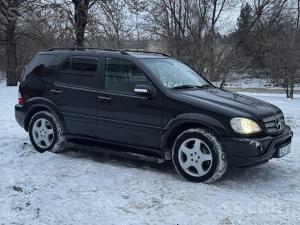 Black Mercedes-Benz ml-55-amg 2002 in Riga, with an engine capacity of 5.50 L and mileage of 265 thousand km for 5900 €, photo 4 on AUTOMOTO.COM.LV