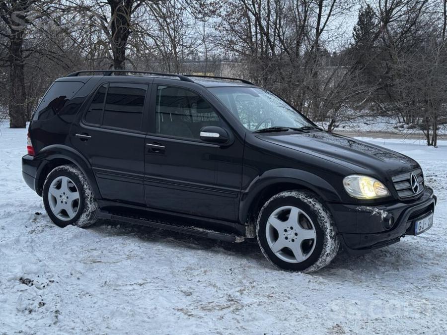 Black Mercedes-Benz ml-55-amg 2002 in Riga, with an engine capacity of 5.50 L and mileage of 265 thousand km for 5900 €, photo 4 on AUTOMOTO.COM.LV