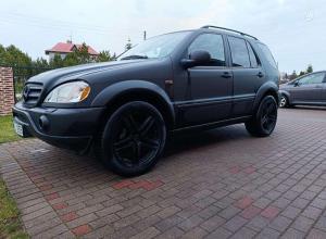 Black Mercedes-Benz ml-55-amg 2002 in Kaisiadorys, with an engine capacity of 5.44 L and mileage of 240 thousand km for 5500 €, photo 2 on AUTOMOTO.COM.LV