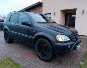 Black Mercedes-Benz ml-55-amg 2002 in Kaisiadorys, with an engine capacity of 5.44 L and mileage of 240 thousand km for 5500 €, photo 3 on AUTOMOTO.COM.LV