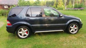 Синий Мерседес МЛ 55 АМГ 2003 в Рига, объемом двигателя 5.40 л и пробегом 205 тыс. км за 8500 €, фото 9 на AUTOMOTO.COM.LV