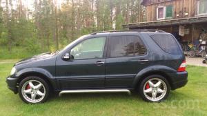 Синий Мерседес МЛ 55 АМГ 2003 в Рига, объемом двигателя 5.40 л и пробегом 205 тыс. км за 8500 €, фото 10 на AUTOMOTO.COM.LV