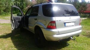 Синий Мерседес МЛ 55 АМГ 2003 в Рига, объемом двигателя 5.40 л и пробегом 205 тыс. км за 8500 €, фото 20 на AUTOMOTO.COM.LV