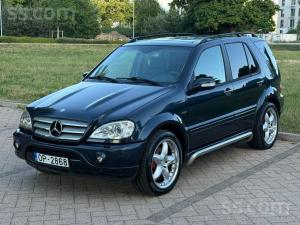 Синий Мерседес МЛ 55 АМГ 2003 в Рига, объемом двигателя 5.40 л и пробегом 205 тыс. км за 3990 €, фото 4 на AUTOMOTO.COM.LV