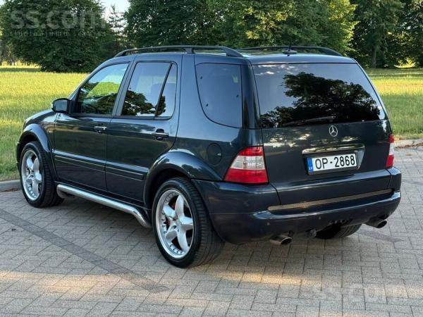 Blue Mercedes-Benz ml-55-amg 2003 in Riga, with an engine capacity of 5.40 L and mileage of 205 thousand km for 3990 €, photo 4 on AUTOMOTO.COM.LV