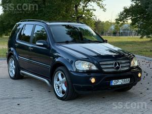 Синий Мерседес МЛ 55 АМГ 2003 в Рига, объемом двигателя 5.40 л и пробегом 205 тыс. км за 3990 €, фото 9 на AUTOMOTO.COM.LV