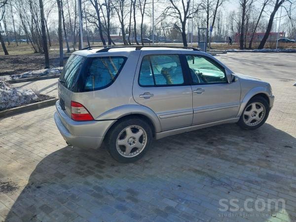 Grey Mercedes-Benz ml-55-amg 2002 in Riga, with an engine capacity of 5.50 L and mileage of 305 thousand km for 7999 €, photo 5 on AUTOMOTO.COM.LV