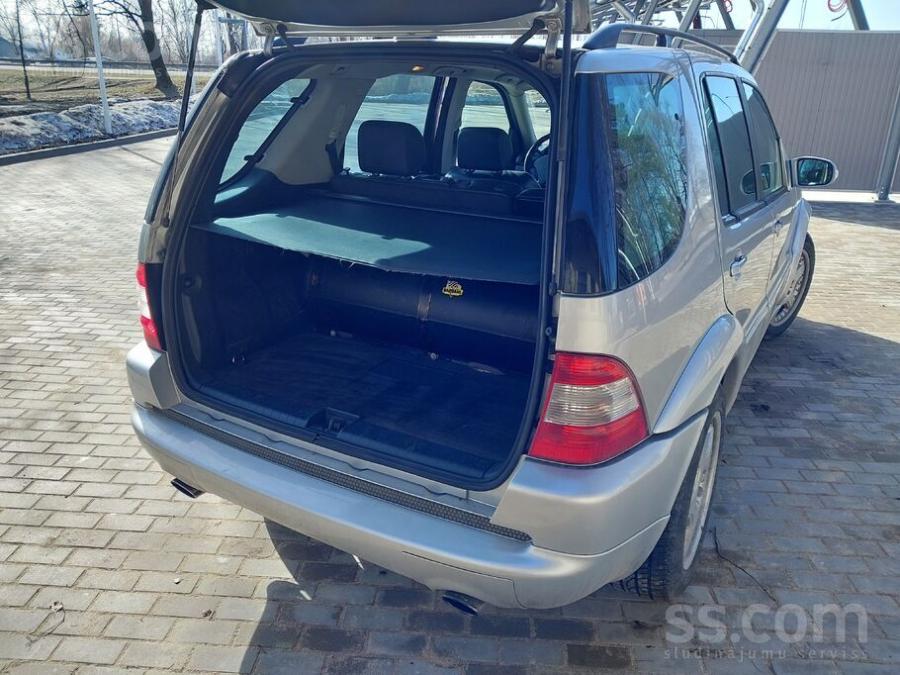 Grey Mercedes-Benz ml-55-amg 2002 in Riga, with an engine capacity of 5.50 L and mileage of 305 thousand km for 7999 €, photo 19 on AUTOMOTO.COM.LV