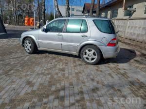 Pelēks Mercedes-Benz ml-55-amg 2002 Rīga, ar dzinēja tilpumu 5.50 L un nobraukumu 305 tūkst. km par 7999 €, foto 3 vietnē AUTOMOTO.COM.LV