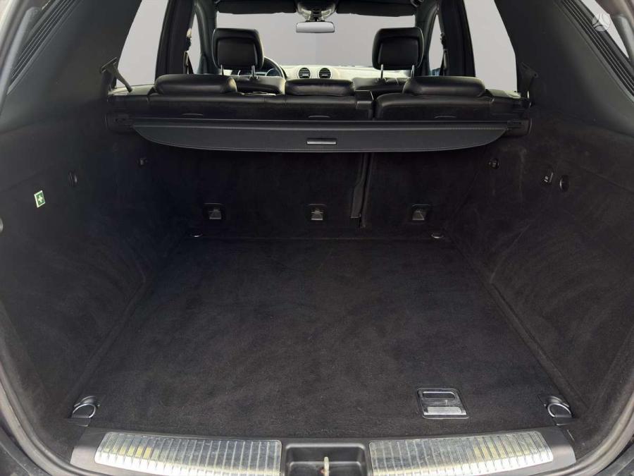 Black Mercedes-Benz ml-63-amg 2008 in Kaunas, with an engine capacity of 6.20 L and mileage of 242 thousand km for 11999 €, photo 12 on AUTOMOTO.COM.LV