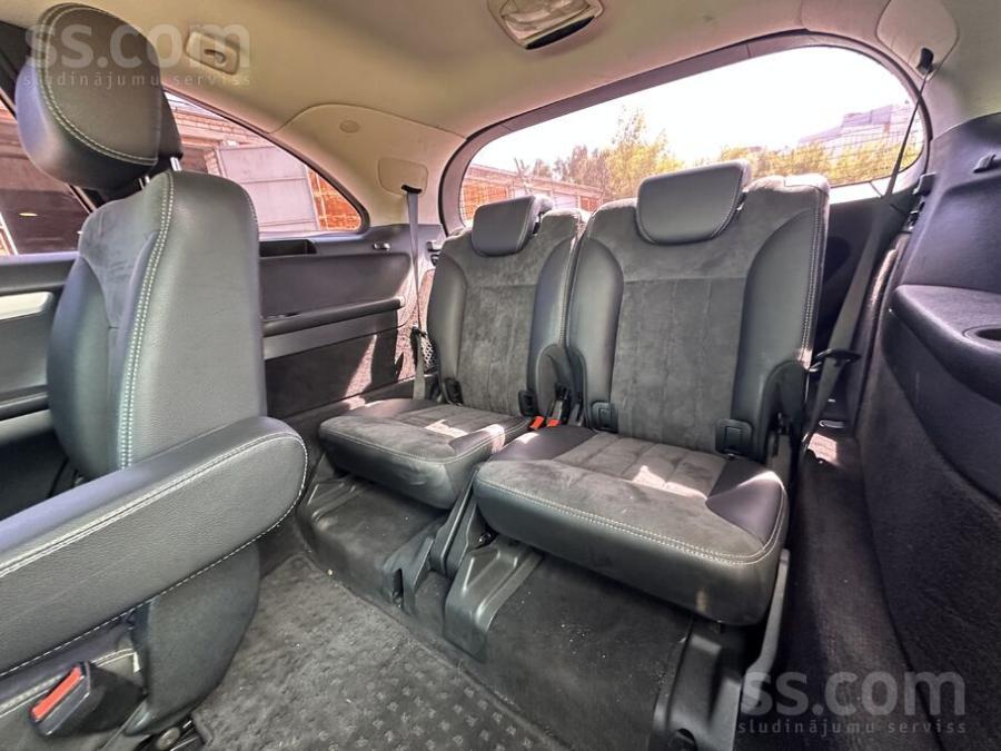 Black Mercedes-Benz R 320 2007 in Riga, with an engine capacity of 3.00 L and mileage of 303 thousand km for 4150 €, photo 20 on AUTOMOTO.COM.LV