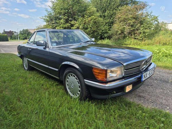 Black Mercedes-Benz sl-300 1985 in Riga, with an engine capacity of 2.96 L and mileage of 244 thousand km for 22400 €, photo 1 on AUTOMOTO.COM.LV