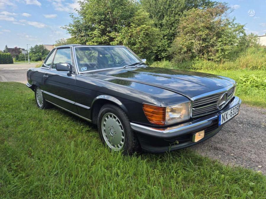 Black Mercedes-Benz sl-300 1985 in Riga, with an engine capacity of 2.96 L and mileage of 244 thousand km for 22400 €, photo 1 on AUTOMOTO.COM.LV