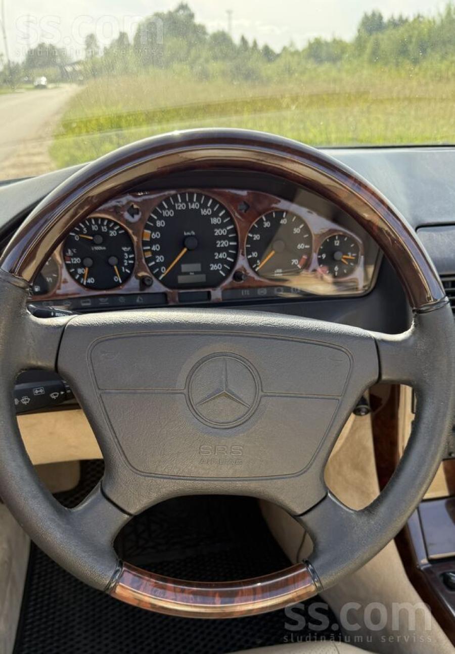 Violet Mercedes-Benz sl-320 1994 in Riga, with an engine capacity of 3.20 L and mileage of 295 thousand km for 11750 €, photo 6 on AUTOMOTO.COM.LV