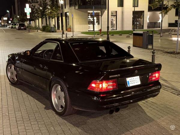 Black Mercedes-Benz SL 500 1999 in Vilnius, with an engine capacity of 5.03 L and mileage of 67 thousand km for 19800 €, photo 2 on AUTOMOTO.COM.LV