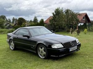 Black Mercedes-Benz SL 500 1999 in Vilnius, with an engine capacity of 5.03 L and mileage of 67 thousand km for 19800 €, photo 3 on AUTOMOTO.COM.LV