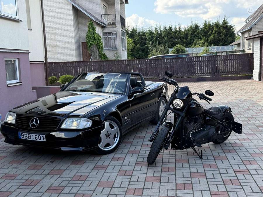 Black Mercedes-Benz SL 500 1999 in Vilnius, with an engine capacity of 5.03 L and mileage of 67 thousand km for 19800 €, photo 4 on AUTOMOTO.COM.LV