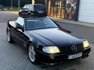 Black Mercedes-Benz SL 500 1999 in Vilnius, with an engine capacity of 5.03 L and mileage of 67 thousand km for 19800 €, photo 5 on AUTOMOTO.COM.LV