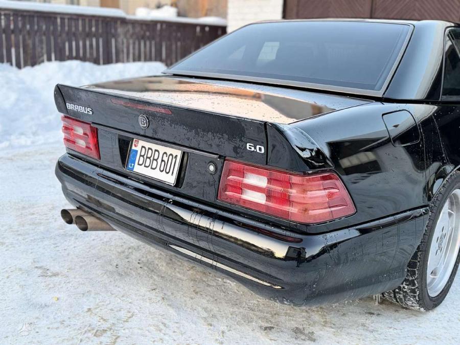 Black Mercedes-Benz SL 500 1999 in Vilnius, with an engine capacity of 5.03 L and mileage of 67 thousand km for 19800 €, photo 16 on AUTOMOTO.COM.LV