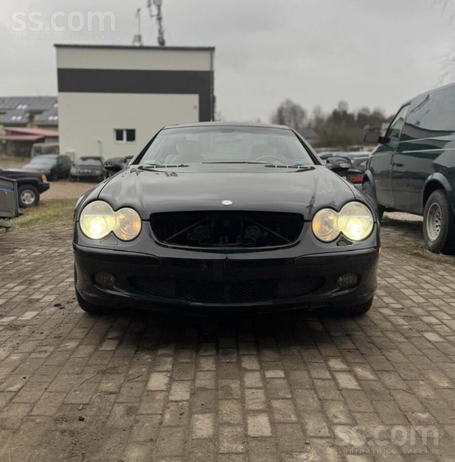 Melns Mercedes-Benz SL 500 2003 Rīga, ar dzinēja tilpumu 5.00 L un nobraukumu 115 tūkst. km par 5500 €, foto 1 vietnē AUTOMOTO.COM.LV