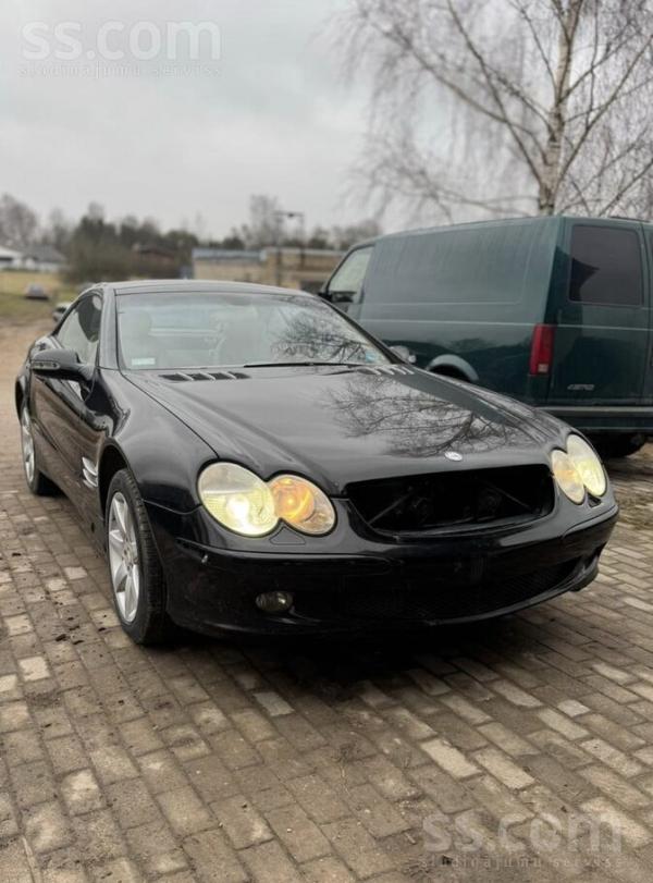 Black Mercedes-Benz SL 500 2003 in Riga, with an engine capacity of 5.00 L and mileage of 115 thousand km for 5500 €, photo 2 on AUTOMOTO.COM.LV