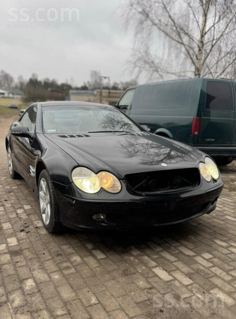 Melns Mercedes-Benz SL 500 2003 Rīga, ar dzinēja tilpumu 5.00 L un nobraukumu 115 tūkst. km par 5500 €, foto 3 vietnē AUTOMOTO.COM.LV
