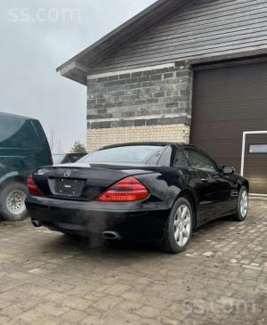 Melns Mercedes-Benz SL 500 2003 Rīga, ar dzinēja tilpumu 5.00 L un nobraukumu 115 tūkst. km par 5500 €, foto 4 vietnē AUTOMOTO.COM.LV