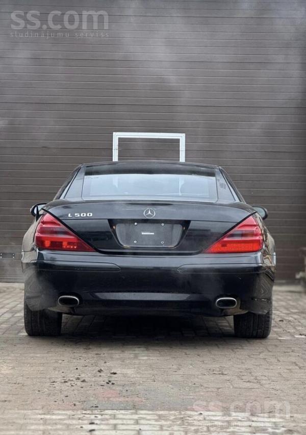 Black Mercedes-Benz SL 500 2003 in Riga, with an engine capacity of 5.00 L and mileage of 115 thousand km for 5500 €, photo 4 on AUTOMOTO.COM.LV