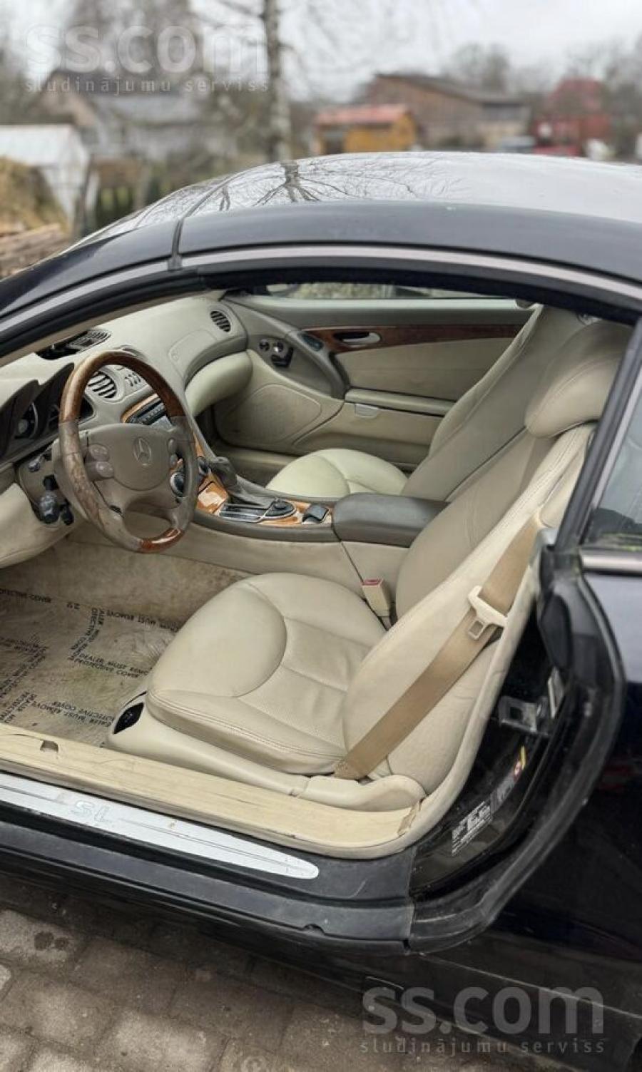 Melns Mercedes-Benz SL 500 2003 Rīga, ar dzinēja tilpumu 5.00 L un nobraukumu 115 tūkst. km par 5500 €, foto 8 vietnē AUTOMOTO.COM.LV