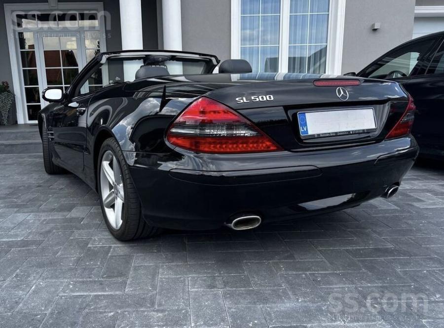 Black Mercedes-Benz SL 500 2003 in Riga, with an engine capacity of 5.00 L and mileage of 155 thousand km for 14500 €, photo 1 on AUTOMOTO.COM.LV