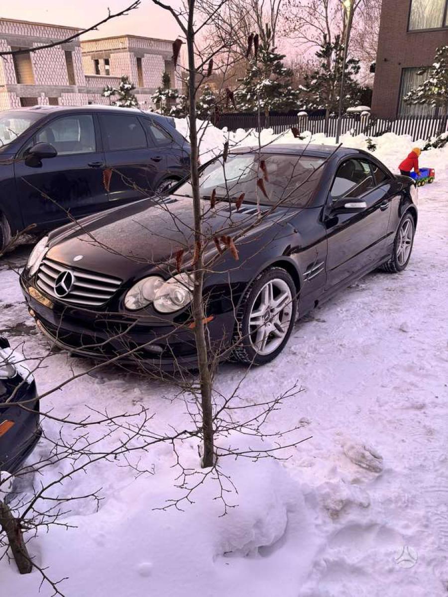 Black Mercedes-Benz SL 500 2006 in Klaipeda, with an engine capacity of 5.50 L and mileage of 177 thousand km for 6999 €, photo 1 on AUTOMOTO.COM.LV