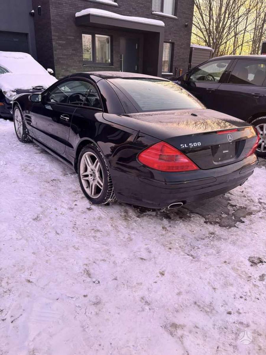 Black Mercedes-Benz SL 500 2006 in Klaipeda, with an engine capacity of 5.50 L and mileage of 177 thousand km for 6999 €, photo 2 on AUTOMOTO.COM.LV