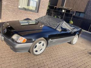 Black Mercedes-Benz SL 500 1995 in Vilnius, with an engine capacity of 4.97 L and mileage of 182 thousand km for 15900 €, photo  on AUTOMOTO.COM.LV