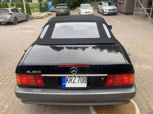 Black Mercedes-Benz SL 500 1995 in Vilnius, with an engine capacity of 4.97 L and mileage of 182 thousand km for 15900 €, photo 3 on AUTOMOTO.COM.LV