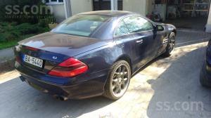 Blue Mercedes-Benz SL 500 2002 in Riga, with an engine capacity of 6.10 L and mileage of 179 thousand km for 36000 €, photo 4 on AUTOMOTO.COM.LV