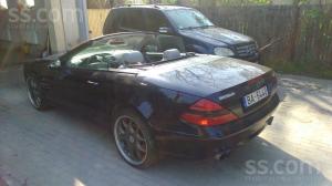 Blue Mercedes-Benz SL 500 2002 in Riga, with an engine capacity of 6.10 L and mileage of 179 thousand km for 36000 €, photo 14 on AUTOMOTO.COM.LV
