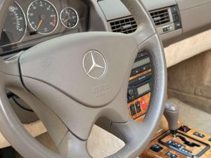 Brown Mercedes-Benz SL 500 1999 in Vilnius, with an engine capacity of 4.97 L and mileage of 155 thousand km for 24990 €, photo 13 on AUTOMOTO.COM.LV
