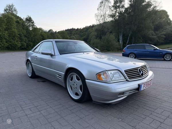 Pelēks Mercedes-Benz SL 500 1999 Viļņa, ar dzinēja tilpumu 5.00 L un nobraukumu 240 tūkst. km par 14000 €, foto 3 vietnē AUTOMOTO.COM.LV