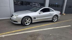 Grey Mercedes-Benz SL 500 2005 in Kaunas, with an engine capacity of 5.00 L and mileage of 179 thousand km for 11999 €, photo  on AUTOMOTO.COM.LV