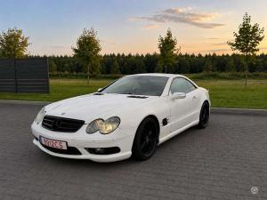 White Mercedes-Benz SL 500 2004 in Panevezys, with an engine capacity of 5.00 L and mileage of 86 thousand km for 19000 €, photo  on AUTOMOTO.COM.LV