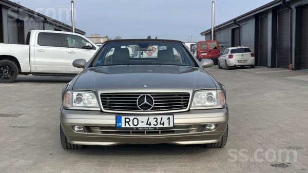 Yellow Mercedes-Benz SL 500 1999 in Jelgava, with an engine capacity of 5.00 L and mileage of 230 thousand km for 14900 €, photo 6 on AUTOMOTO.COM.LV