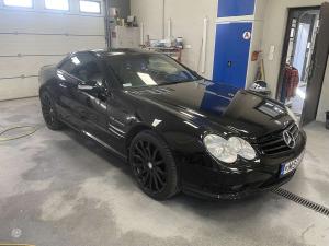 Black Mercedes-Benz SL 55 AMG 2003 in Kaunas, with an engine capacity of 5.44 L and mileage of 122 thousand km for 23999 €, photo  on AUTOMOTO.COM.LV