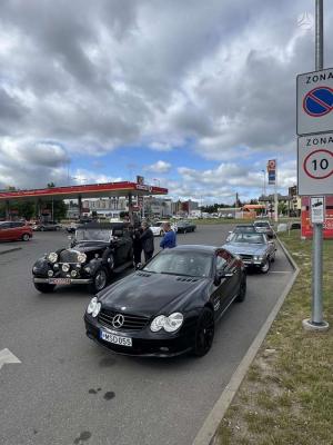 Black Mercedes-Benz SL 55 AMG 2003 in Kaunas, with an engine capacity of 5.44 L and mileage of 122 thousand km for 23999 €, photo 17 on AUTOMOTO.COM.LV