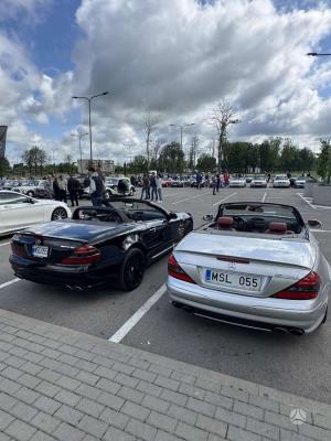 Black Mercedes-Benz SL 55 AMG 2003 in Kaunas, with an engine capacity of 5.44 L and mileage of 122 thousand km for 23999 €, photo 18 on AUTOMOTO.COM.LV