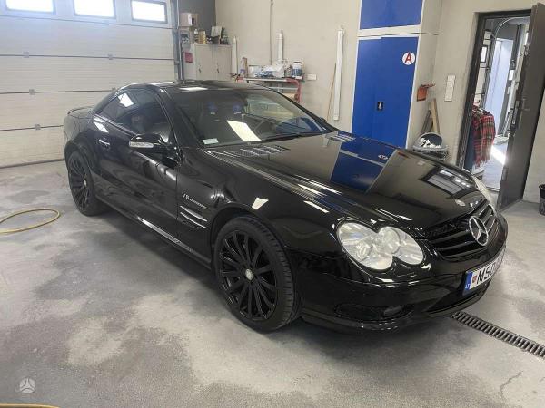 Black Mercedes-Benz SL 55 AMG 2003 in Kaunas, with an engine capacity of 5.44 L and mileage of 122 thousand km for 23999 €, photo 1 on AUTOMOTO.COM.LV
