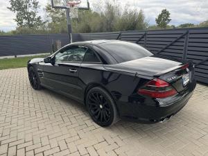 Black Mercedes-Benz SL 55 AMG 2003 in Kaunas, with an engine capacity of 5.44 L and mileage of 122 thousand km for 23999 €, photo 7 on AUTOMOTO.COM.LV