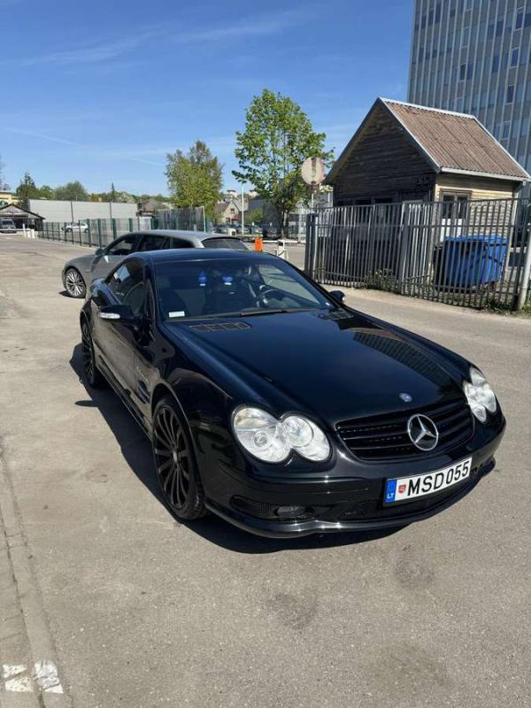 Black Mercedes-Benz SL 55 AMG 2003 in Kaunas, with an engine capacity of 5.44 L and mileage of 122 thousand km for 23999 €, photo 8 on AUTOMOTO.COM.LV