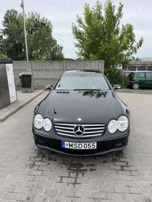 Black Mercedes-Benz SL 55 AMG 2003 in Kaunas, with an engine capacity of 5.44 L and mileage of 122 thousand km for 23999 €, photo 20 on AUTOMOTO.COM.LV