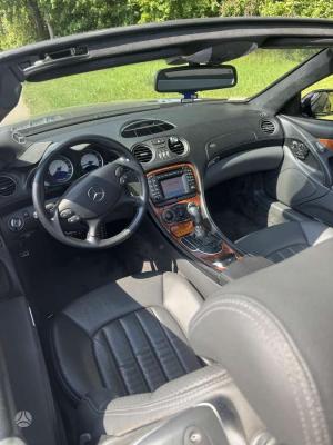 Black Mercedes-Benz SL 55 AMG 2003 in Kaunas, with an engine capacity of 5.44 L and mileage of 122 thousand km for 23999 €, photo 30 on AUTOMOTO.COM.LV